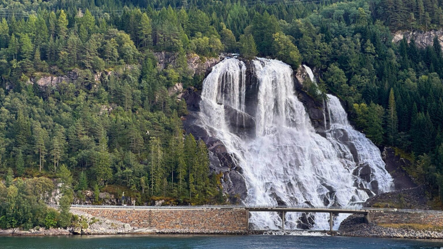 The Power & Beauty of Norway's 12 Most Breathtaking Waterfalls